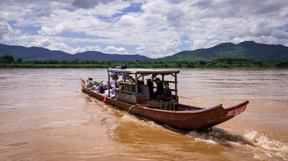 Hoi An vs Pak Beng Travel Guide: Cultural Insights, Costs & Eco-Tours